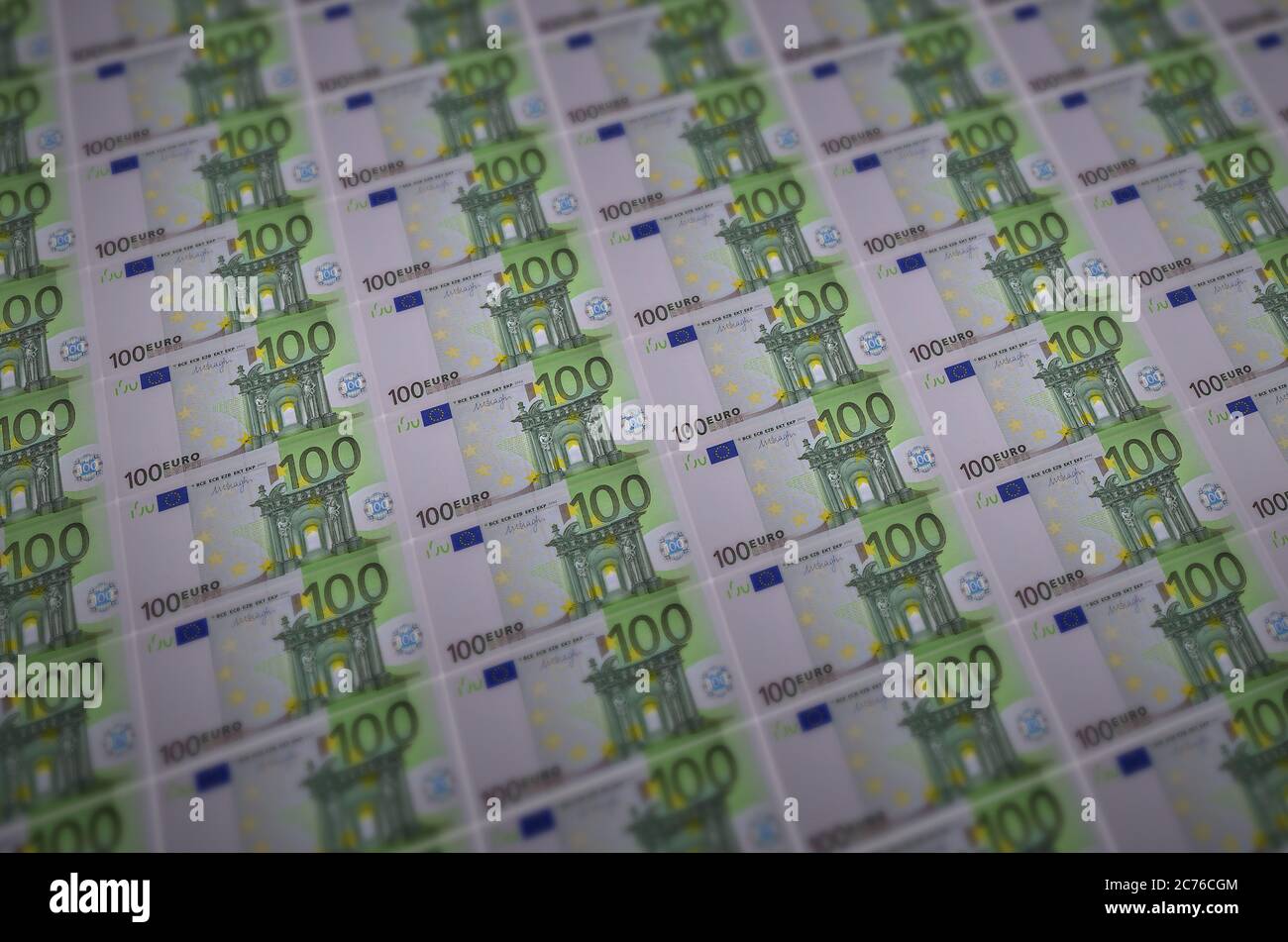 100 Euro bills printed in illegal money production conveyor. Collage of ...