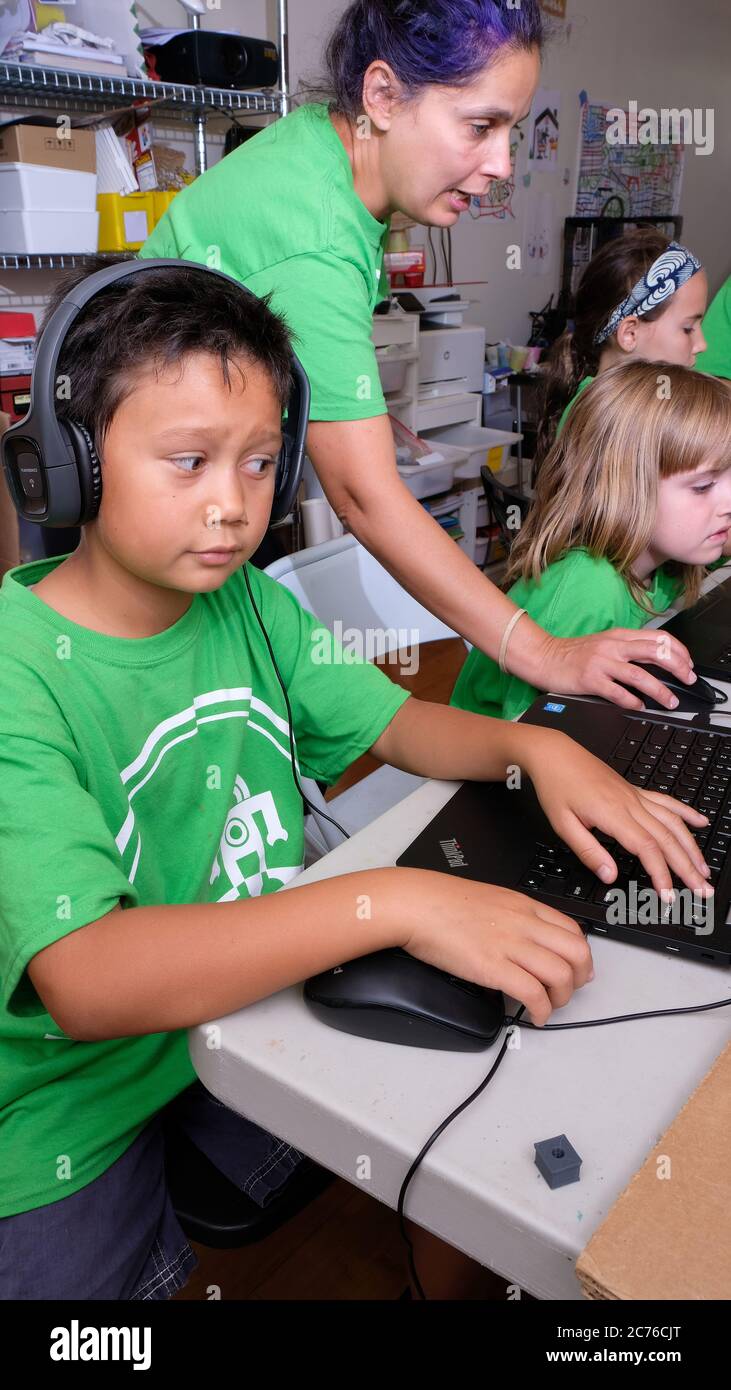 Day Camp. Brooklyn, New York. Kids technology camp. Kids working on ...