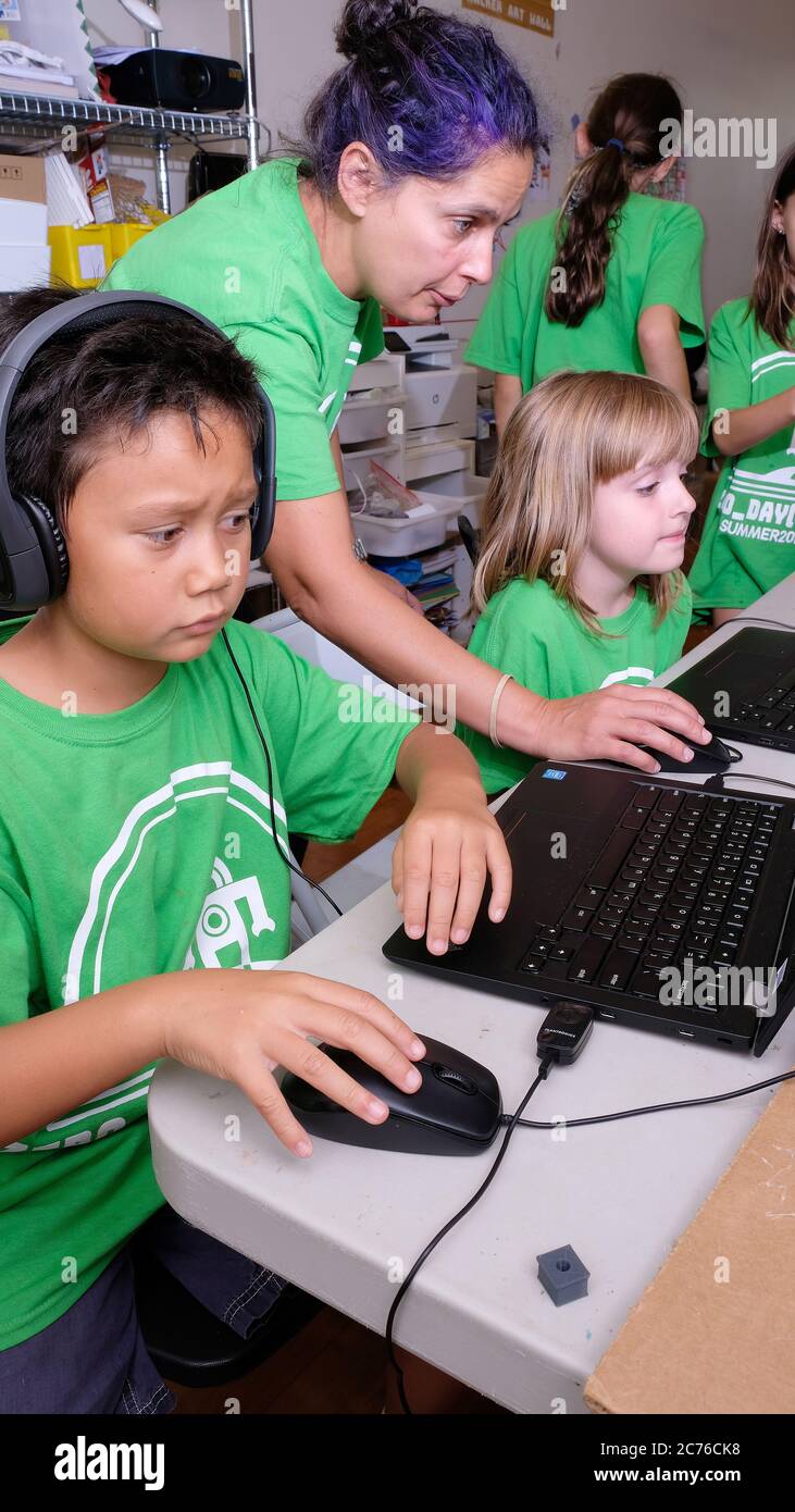 Day Camp. Brooklyn, New York. Kids technology camp. Kids working on ...