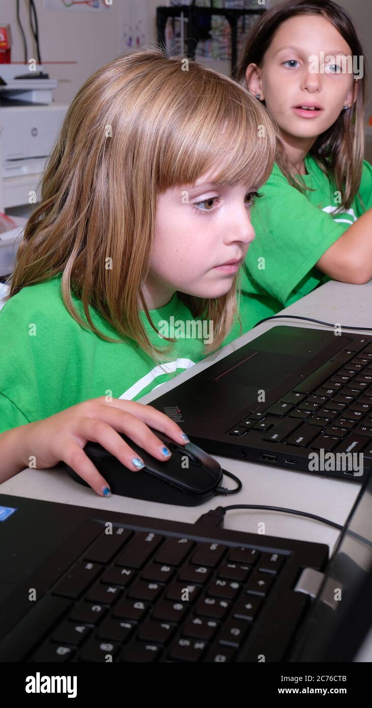 Day Camp. Brooklyn, New York. Kids technology camp. Kids working at ...