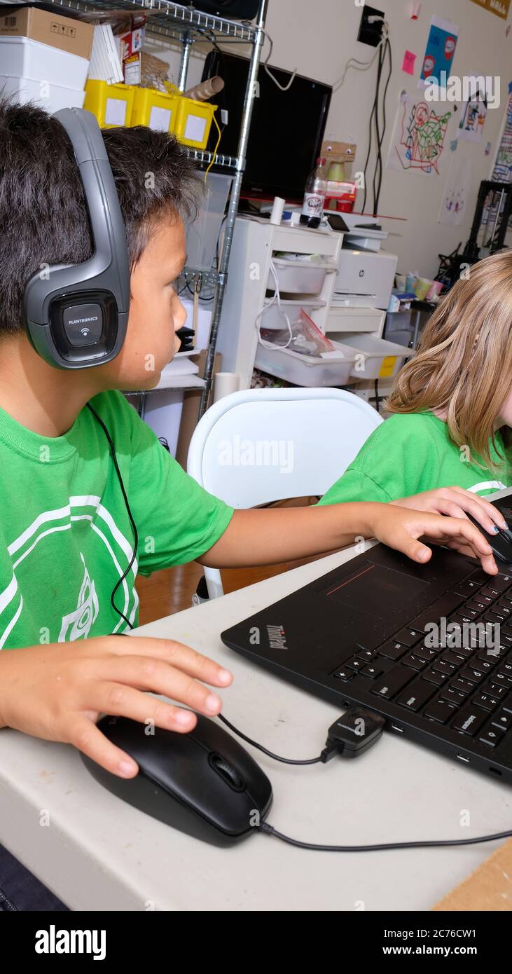 Day Camp. Brooklyn, New York. Kids technology camp. Kids working at ...