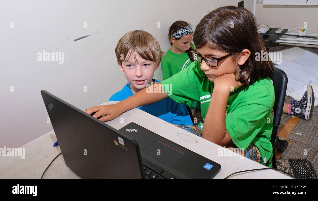 Day Camp. Brooklyn, New York. Kids technology camp. Kids working at ...