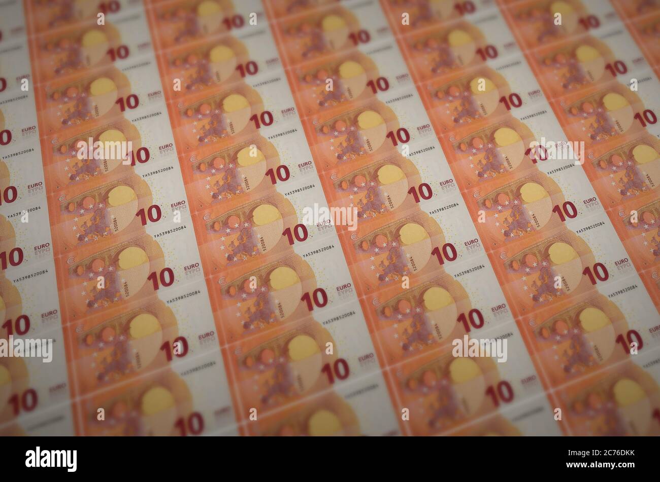 10 euro bills printed in illegal money production conveyor. Collage of ...