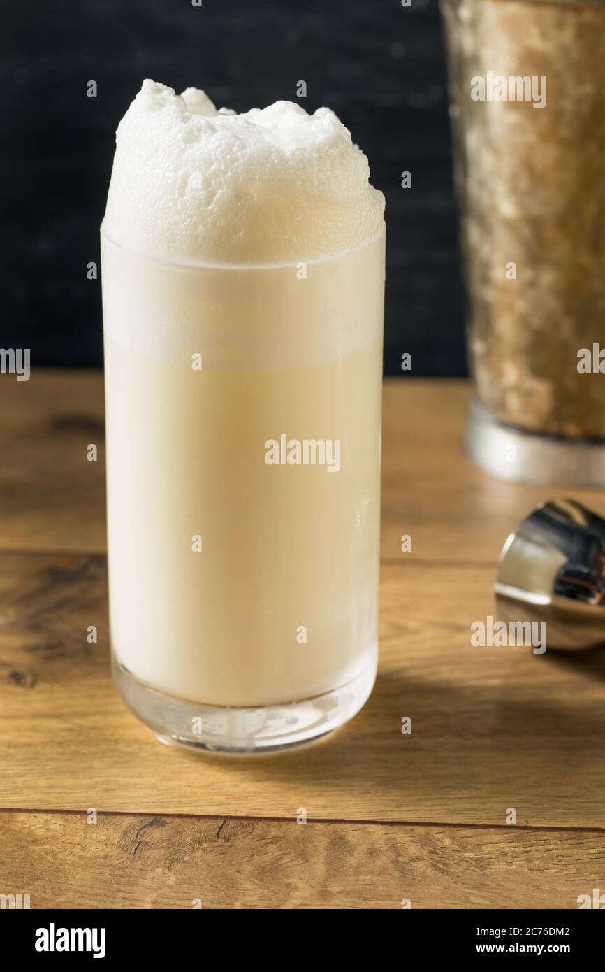 Homemade Frothy Ramos Gin Fizz Cocktail with Cream Stock Photo - Alamy