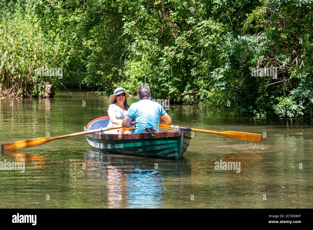 Romantic couple in rowing boat hi-res stock photography and images - Alamy