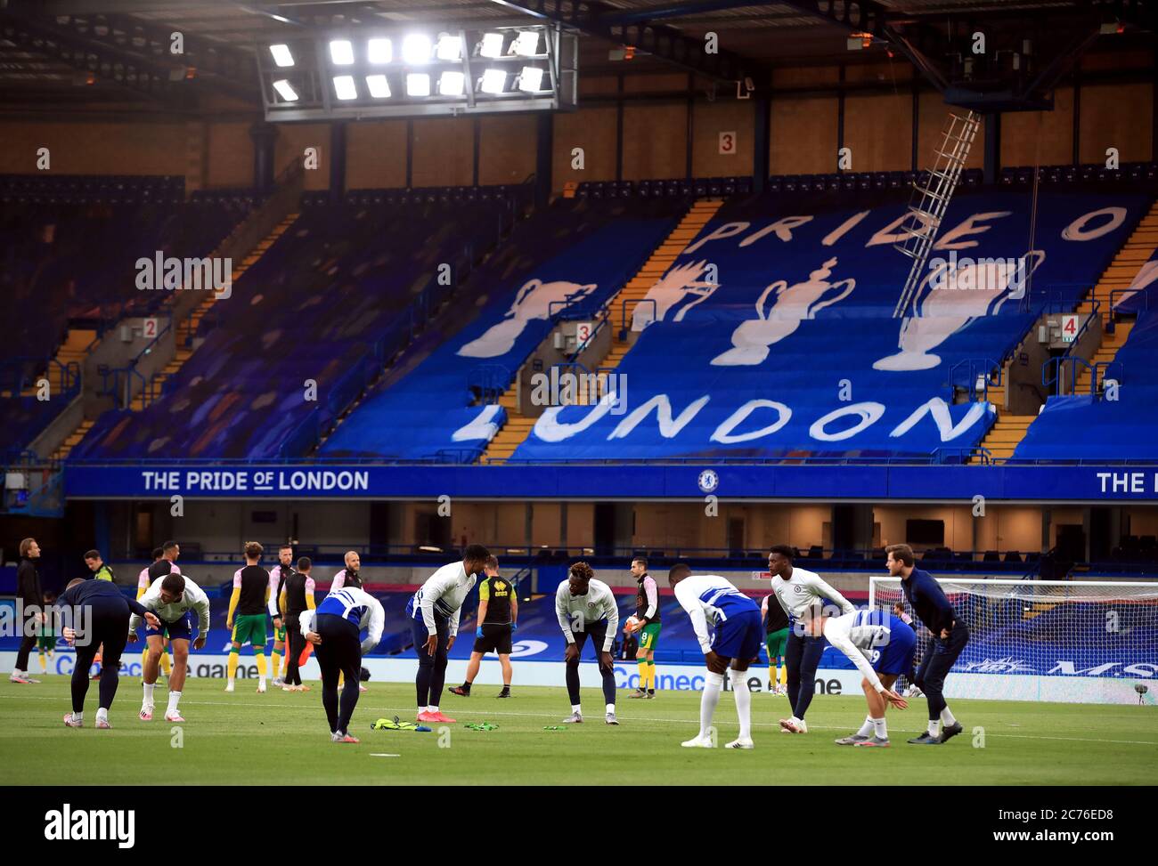 Chelsea warm up on the pitch before the Premier League match at ...