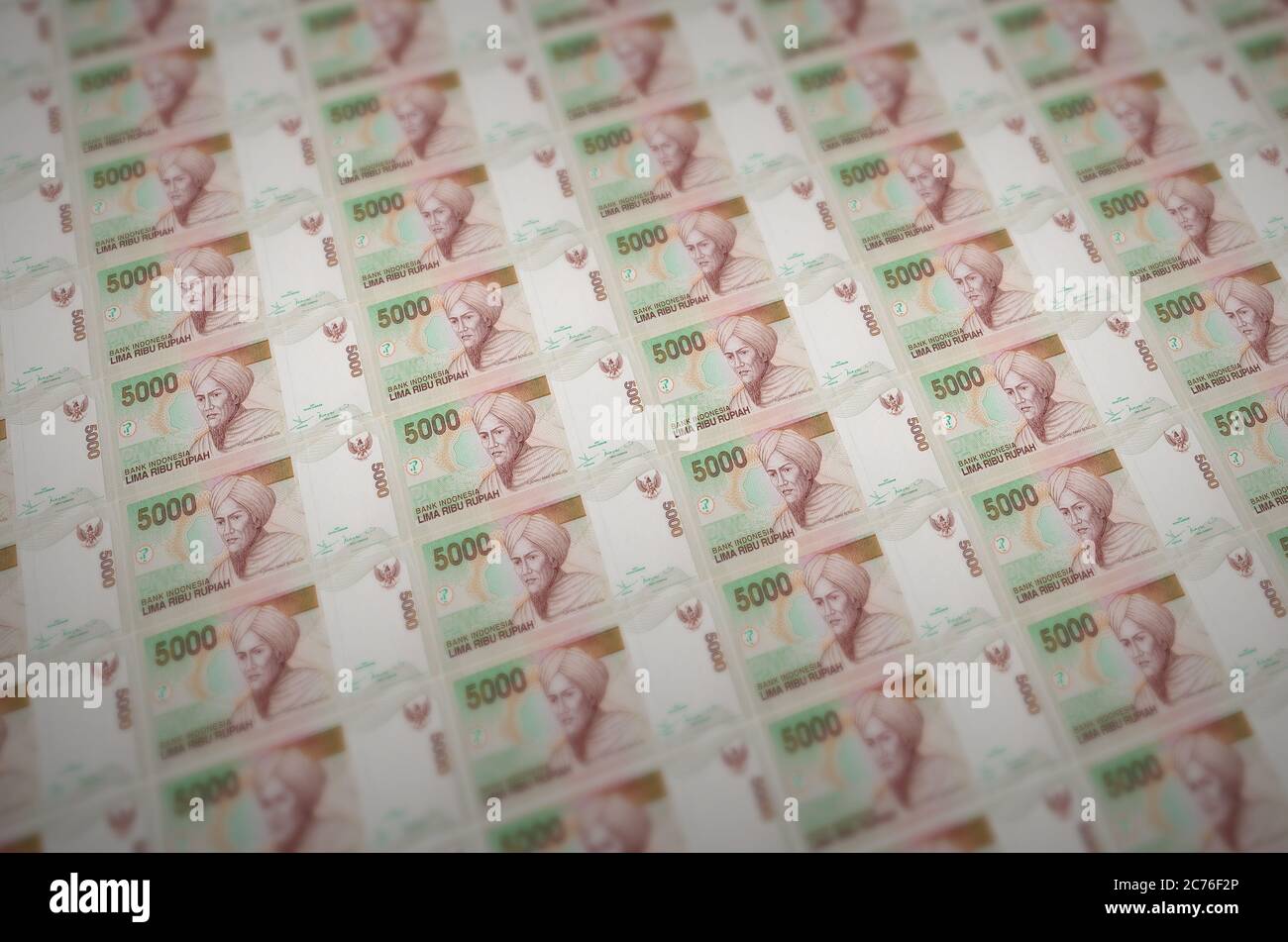 5000 Indonesian rupiah bills printed in illegal money production ...