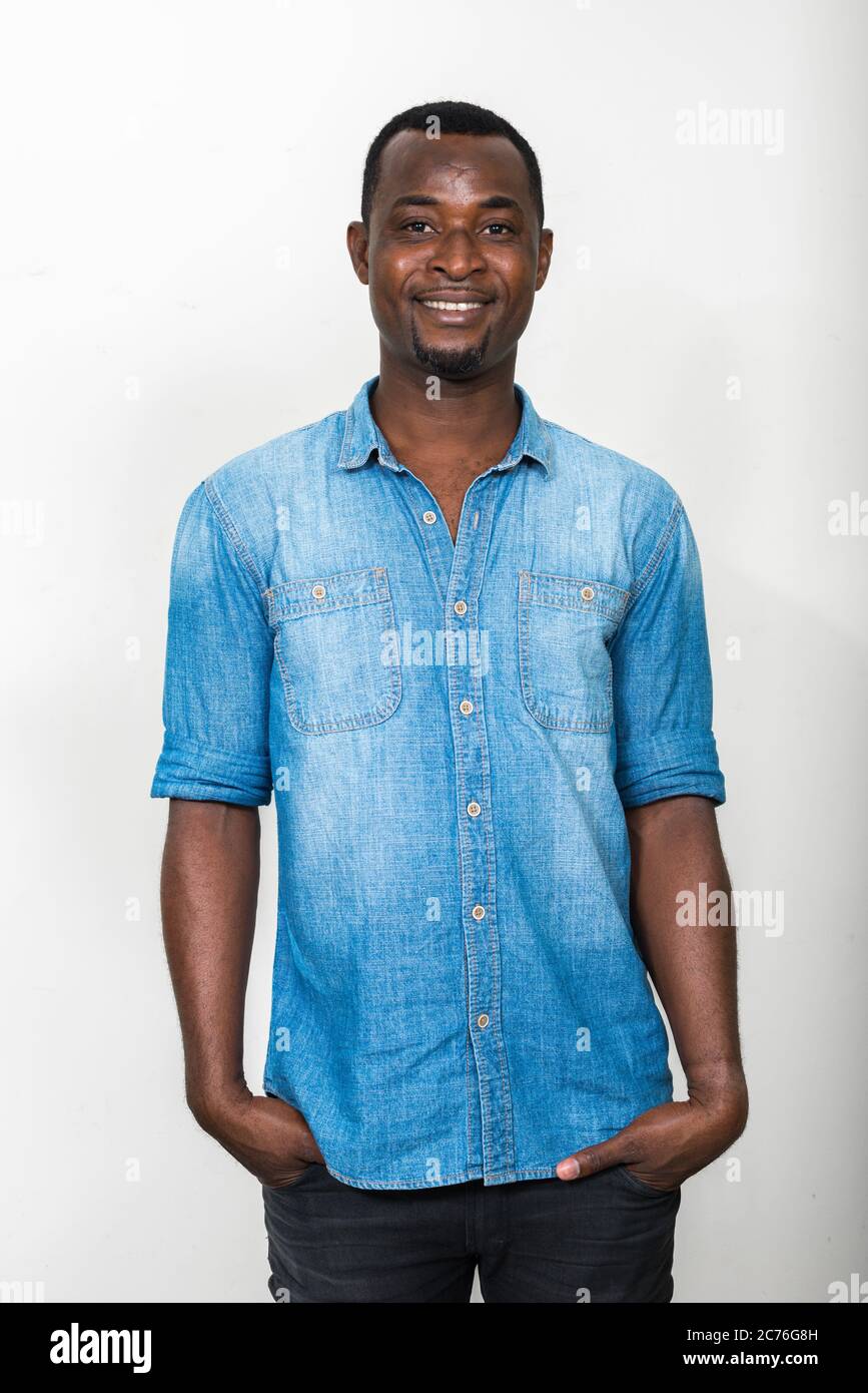 Portrait of handsome bearded African man wearing denim shirt Stock ...