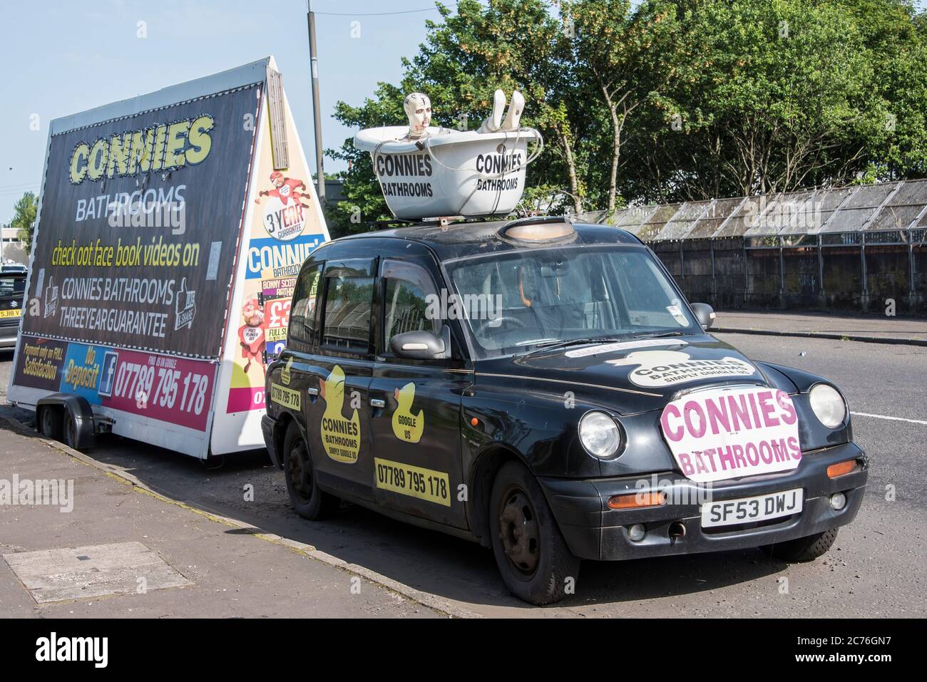 Fun taxi and trailer with mannequin in bath advertising local bathroom ...