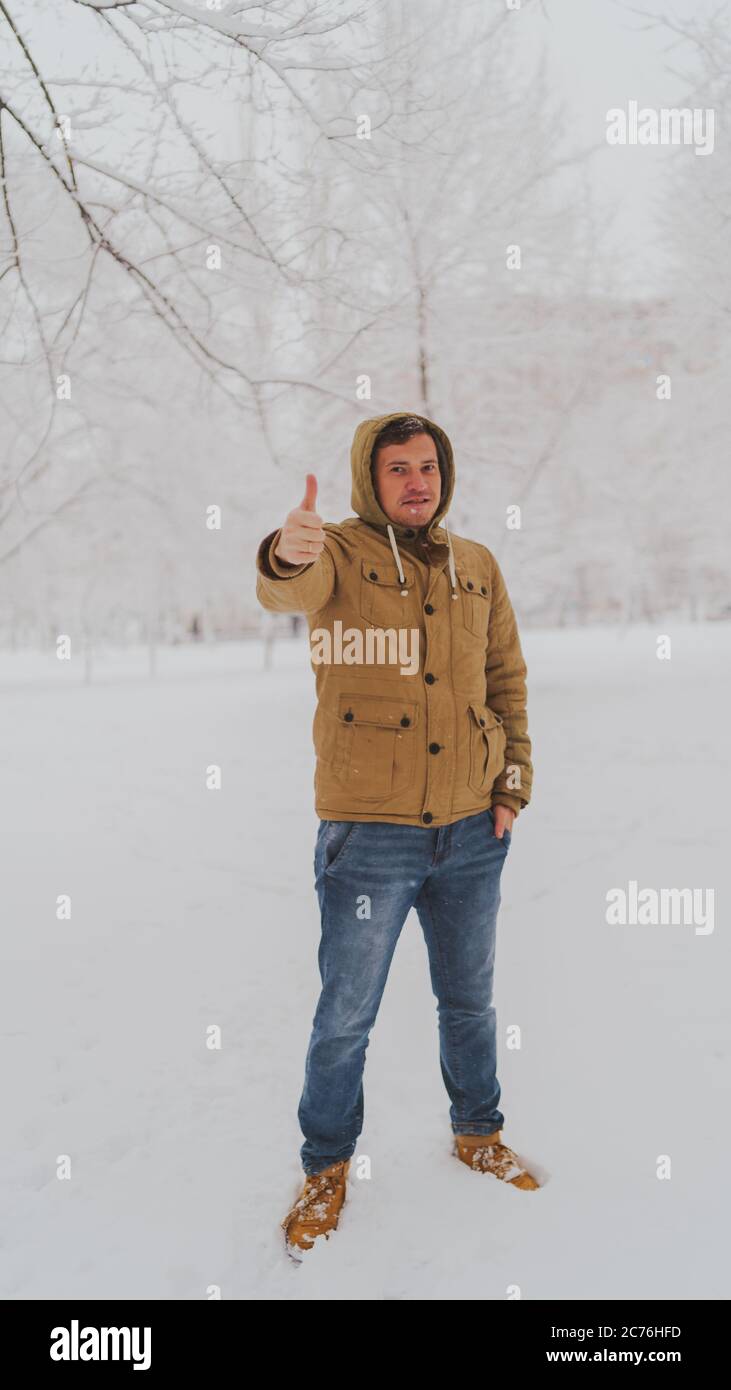 Young man wearing sign hi-res stock photography and images - Alamy