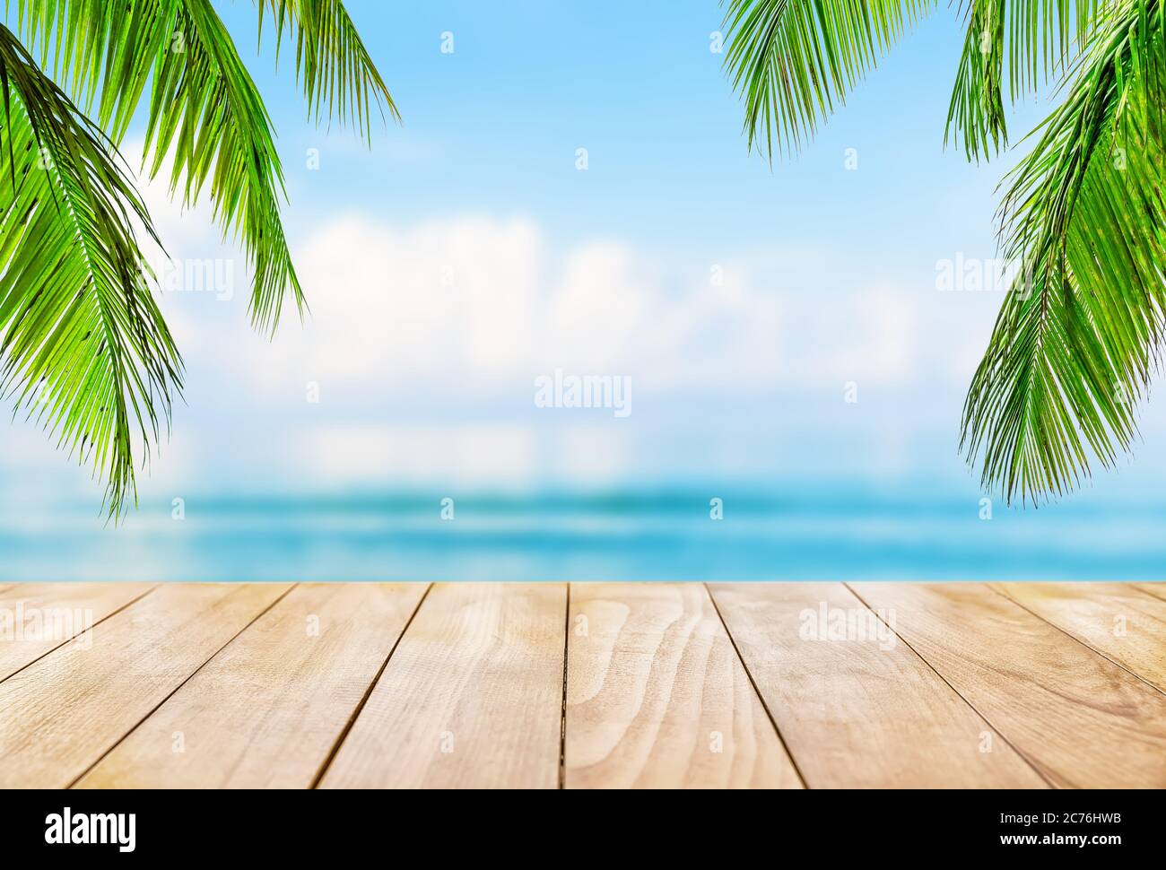 Wooden table top on blue sea and white sand beach background. Coconut ...