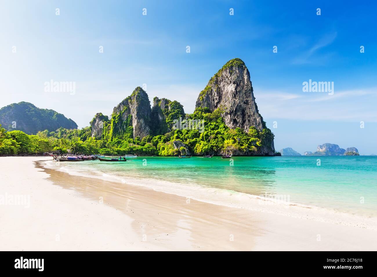 Thai Traditional Wooden Longtail Boat And Beautiful Sand Railay Beach