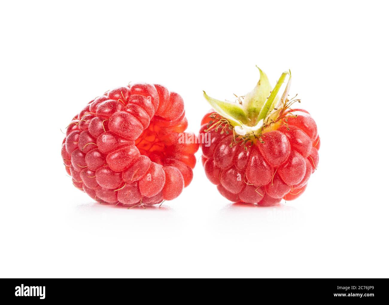 Ripe red raspberries isolated on white background Stock Photo - Alamy