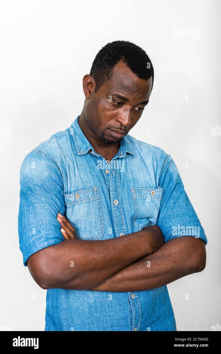 Portrait of handsome bearded African man wearing denim shirt Stock ...