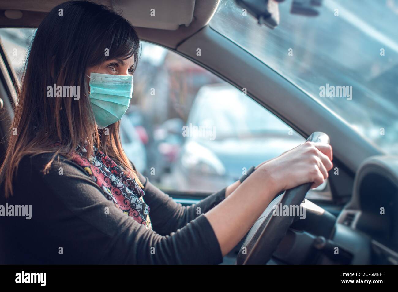 woman driving car with face mask Stock Photo - Alamy