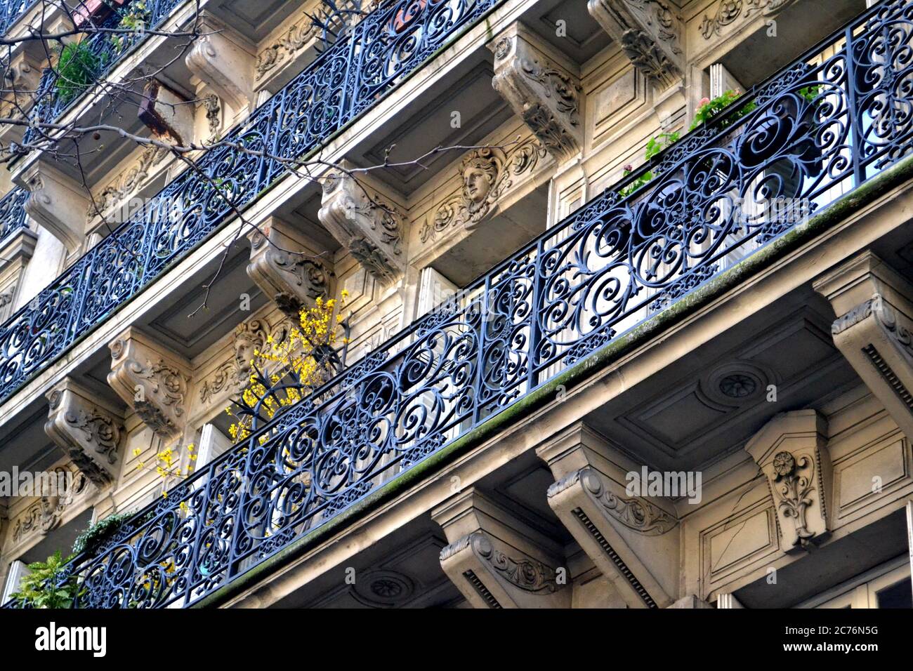 Tiny blue balconies in Paris Stock Photo - Alamy