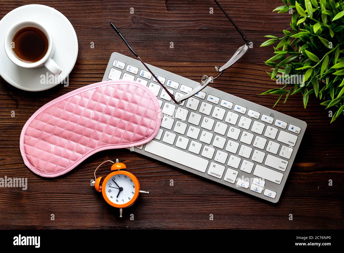 hard work without rest. Concept with sleep mask and laptop top view on ...