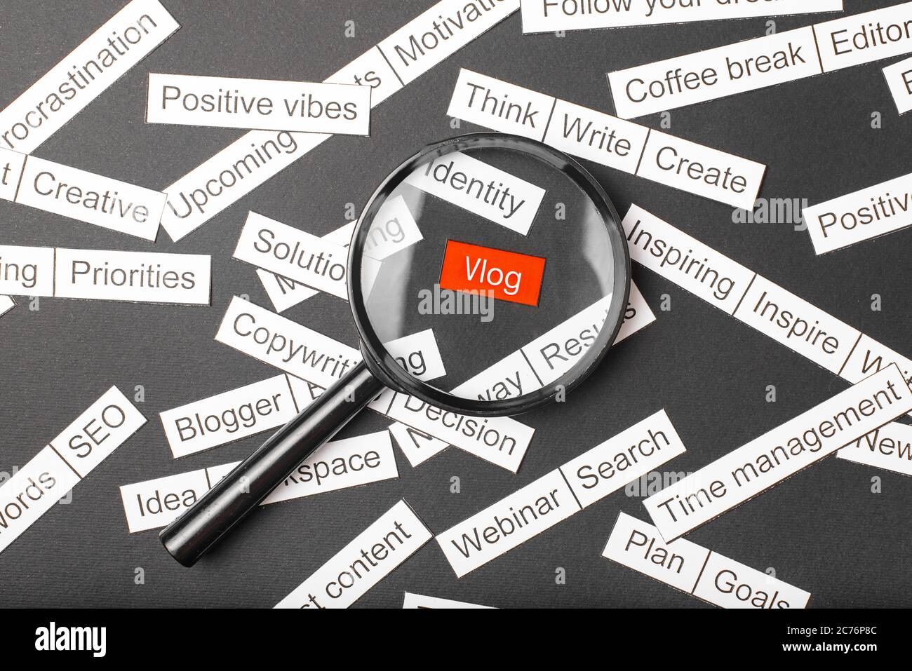 Cut paper inscription inspiration on a red background, surrounded by ...