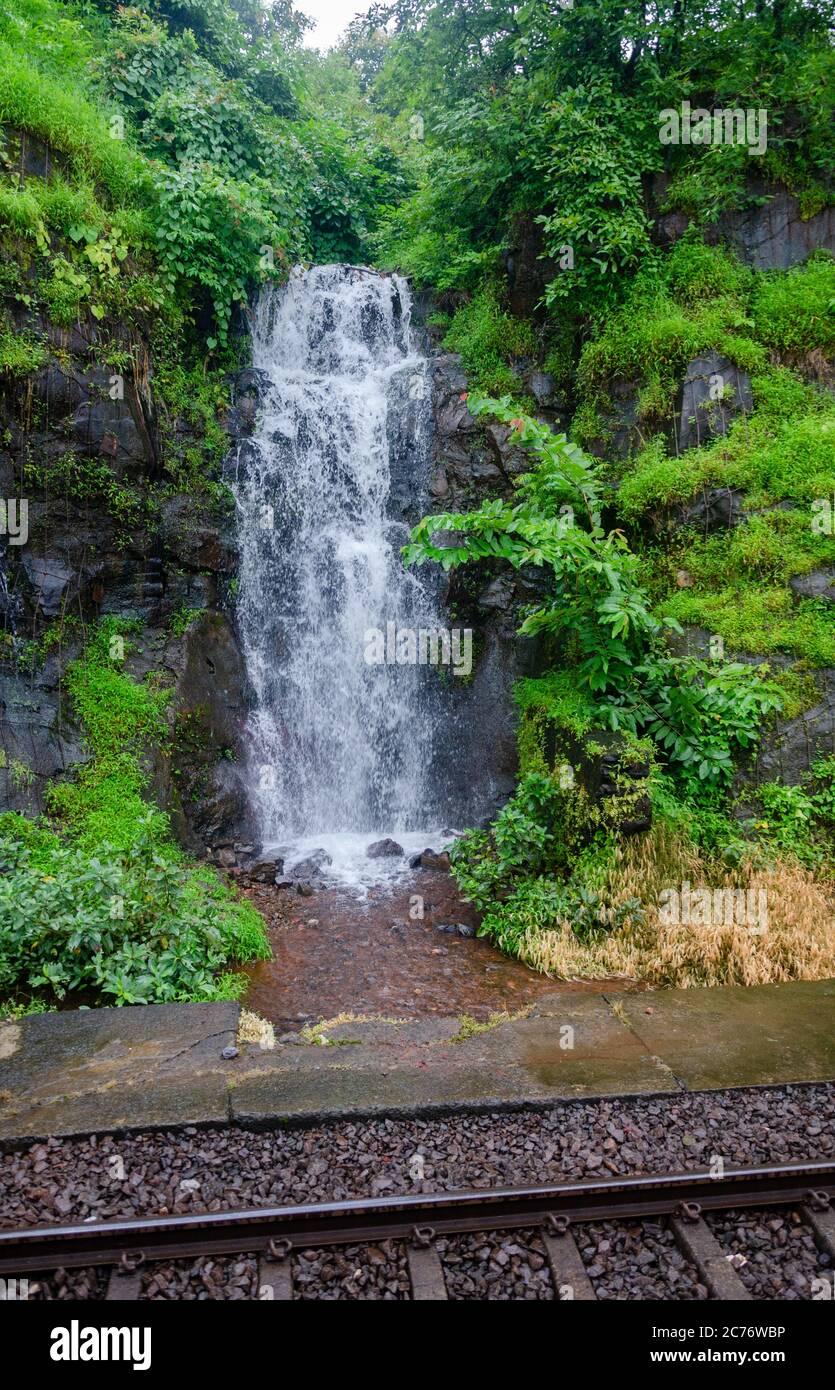 Small waterfall at Ukshi Railway Station on Konkan Railway during ...