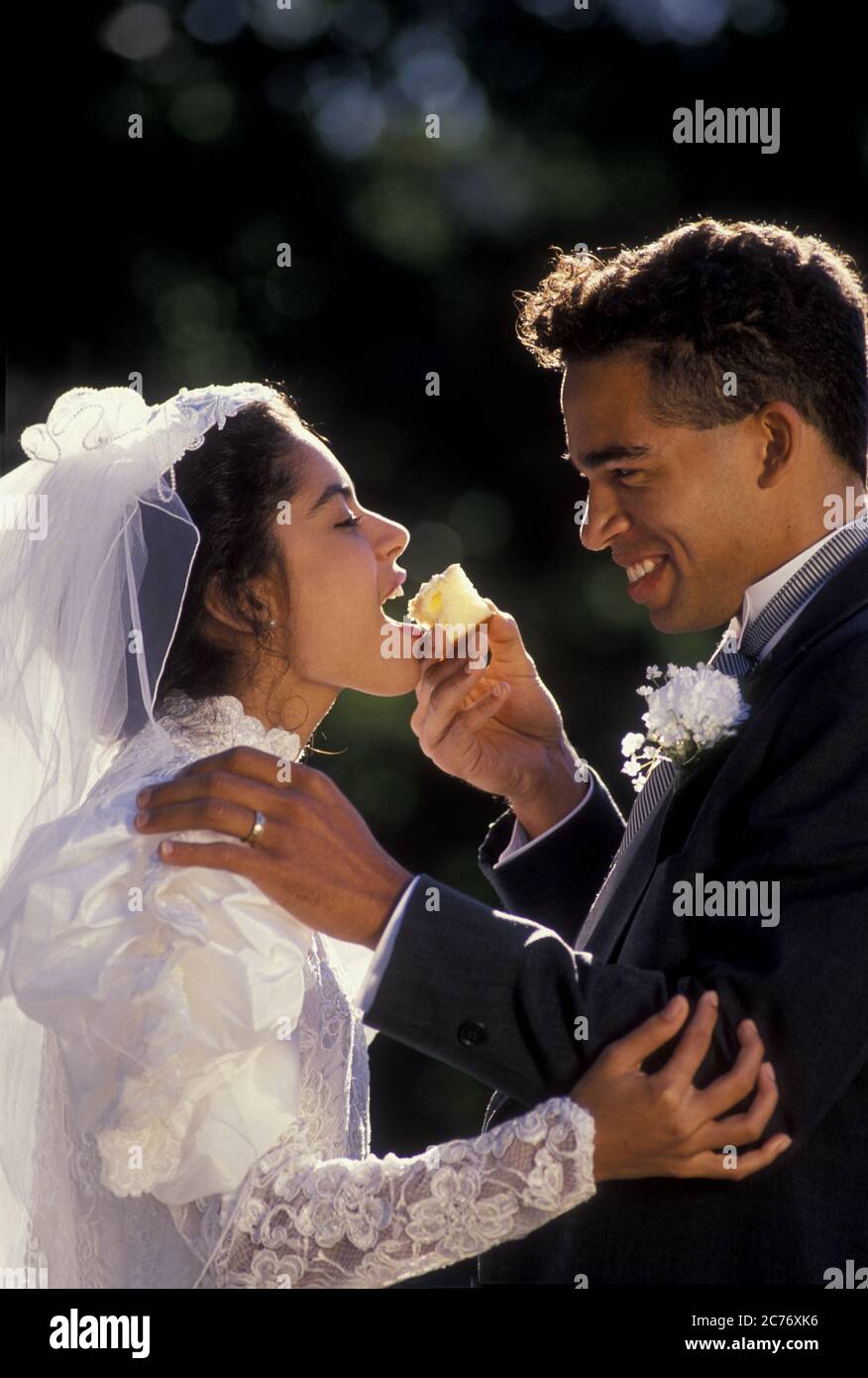 Feeds cake bride hi-res stock photography and images - Alamy