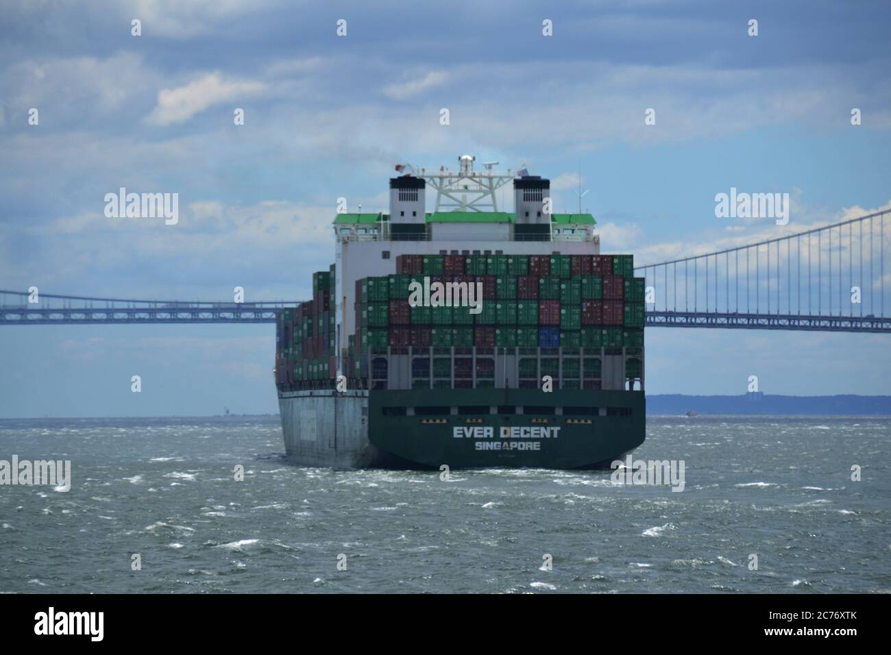 Fully loaded cargo ship at sea Stock Photo - Alamy