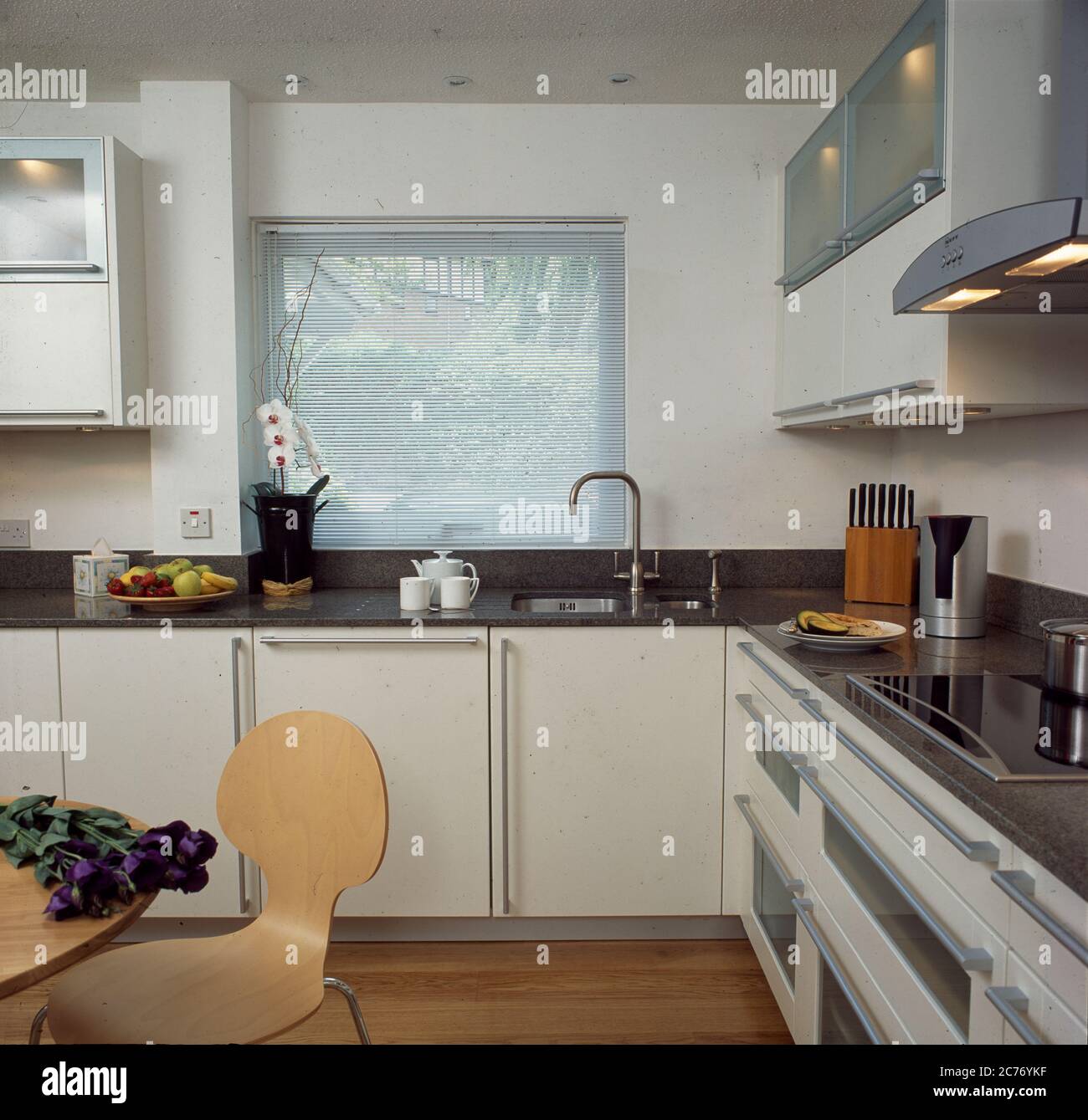 Modern kitchen with white units Stock Photo - Alamy