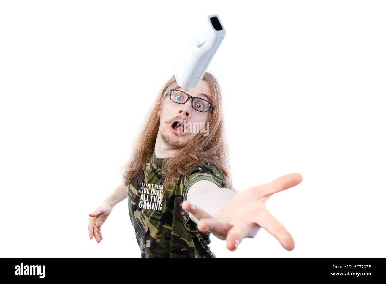 Long Haired Gamer Accidentally Throws Controller Stock Photo - Alamy