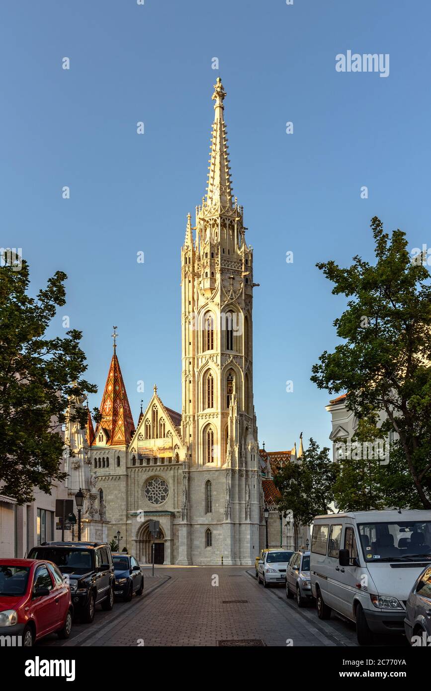 The Matthias Church at golden hour in the Buda Castle District of ...
