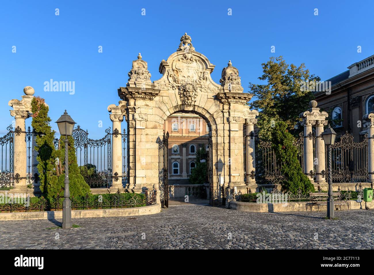 An ornate gate next to the Royal Palace in the Buda Castle District ...