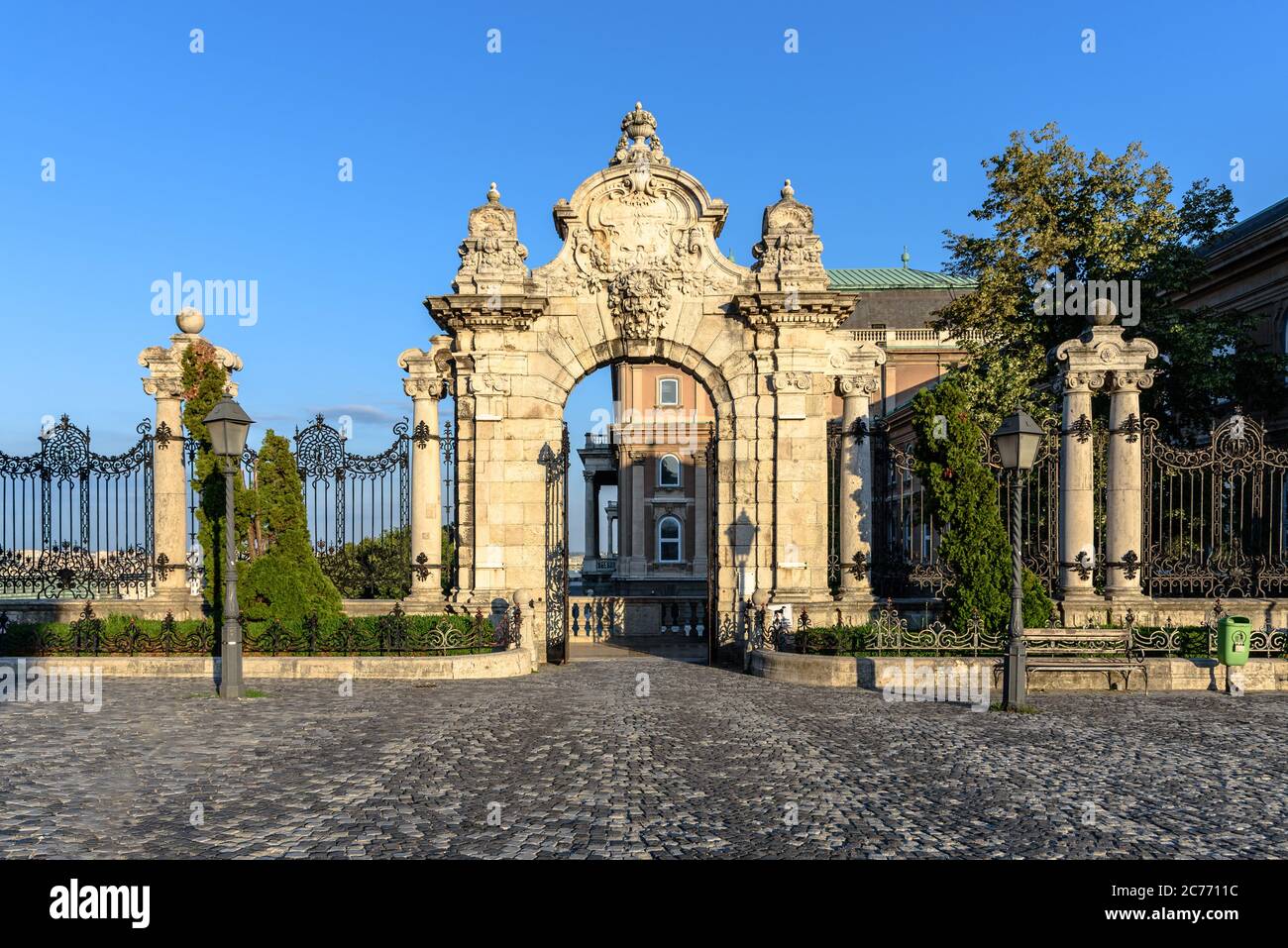 An ornate gate next to the Royal Palace in the Buda Castle District ...