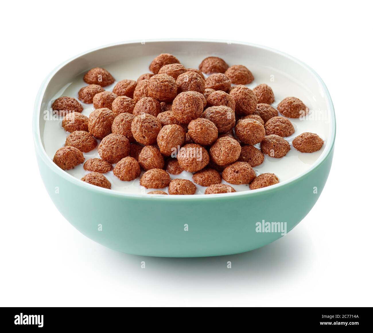 bowl of breakfast cereal balls with milk isolated on white background ...