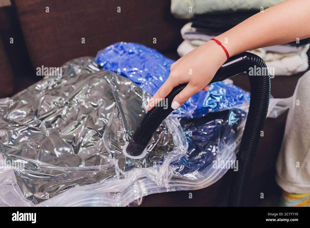 Vacuum packed clothes hi-res stock photography and images - Alamy