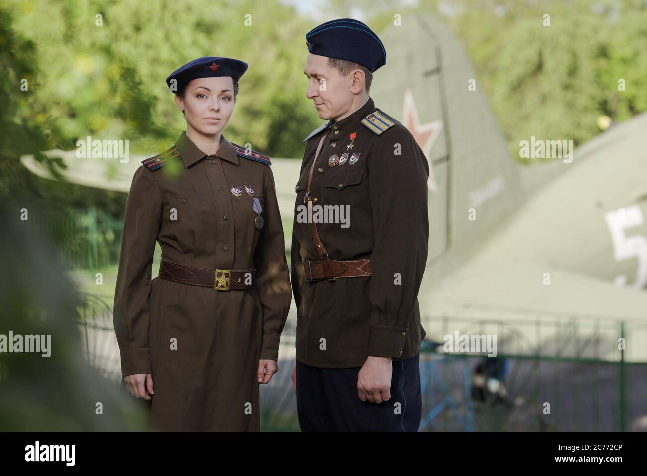 Young adult man and woman in the uniform of pilots of the Soviet Army ...