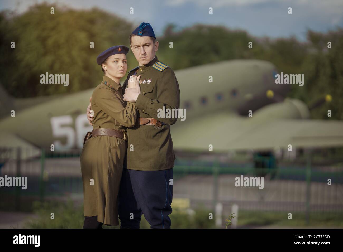 Young adult man and woman in the uniform of pilots of the Soviet Army ...