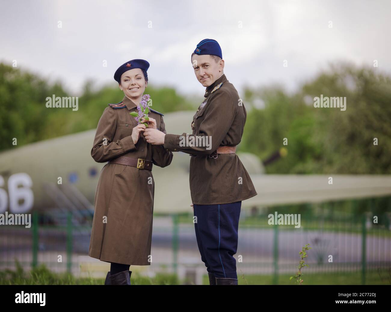 Young adult man and woman in the uniform of pilots of the Soviet Army ...