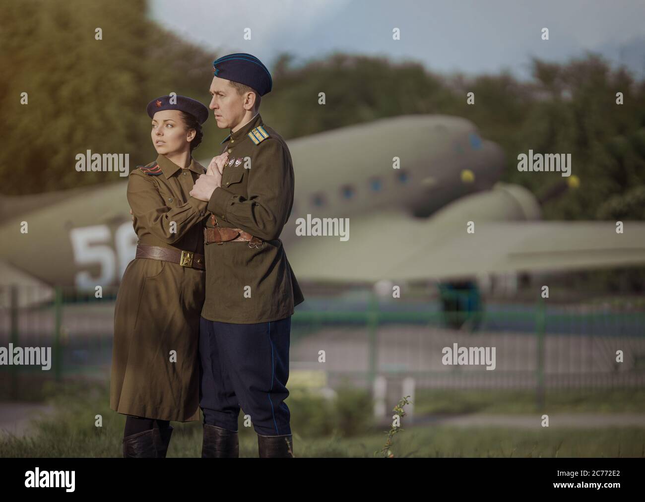 Young adult man and woman in the uniform of pilots of the Soviet Army ...