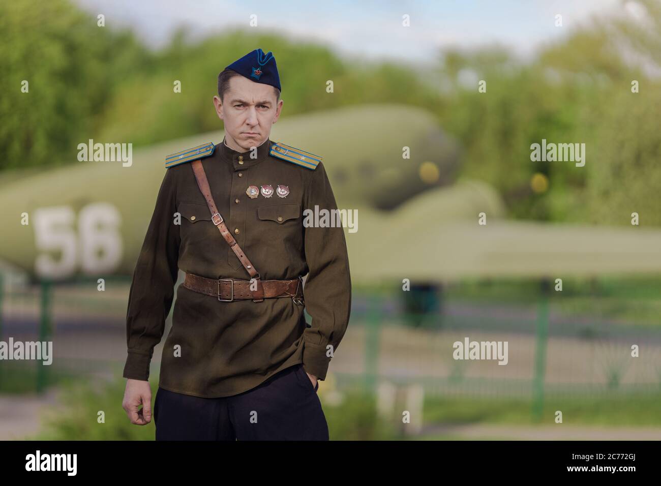 A young adult male pilot in the uniform of pilots of the Soviet Army of ...
