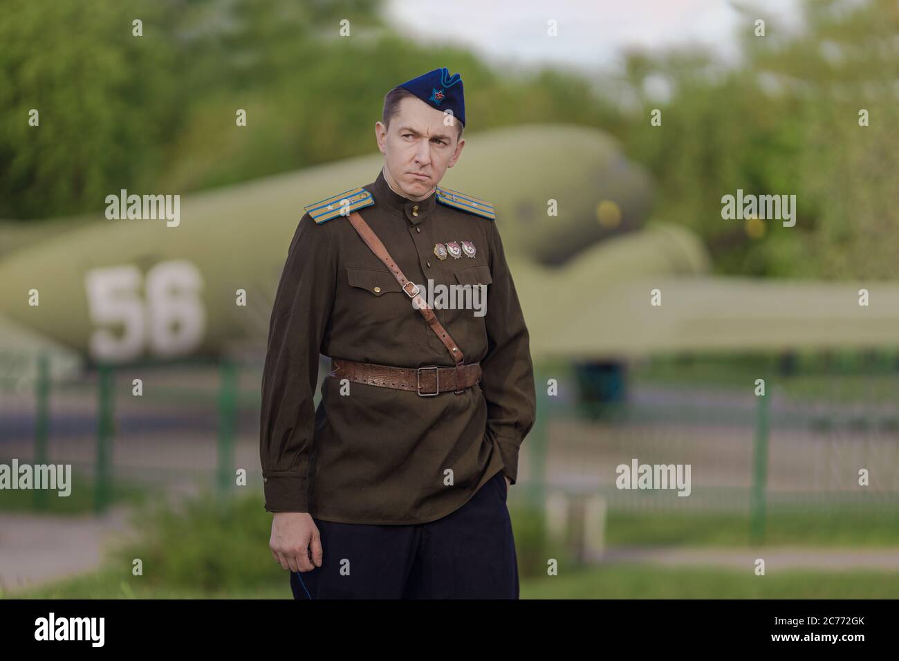 A young adult male pilot in the uniform of pilots of the Soviet Army of ...
