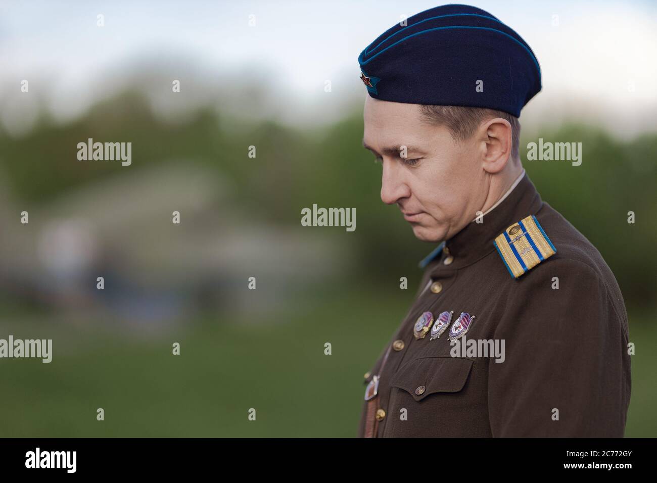 A young adult male pilot in the uniform of pilots of the Soviet Army of ...