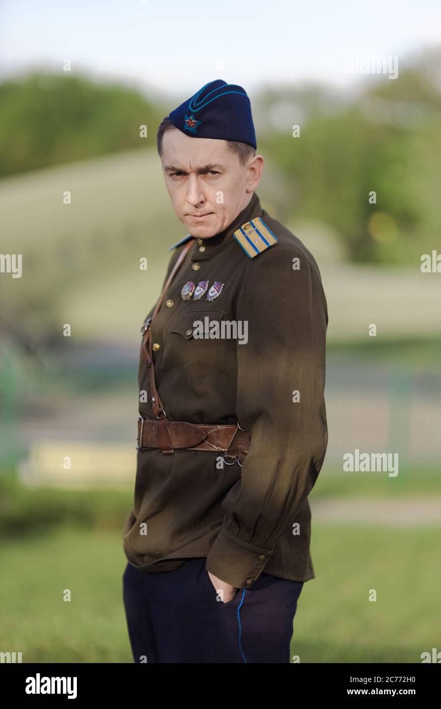 A young adult male pilot in the uniform of pilots of the Soviet Army of ...
