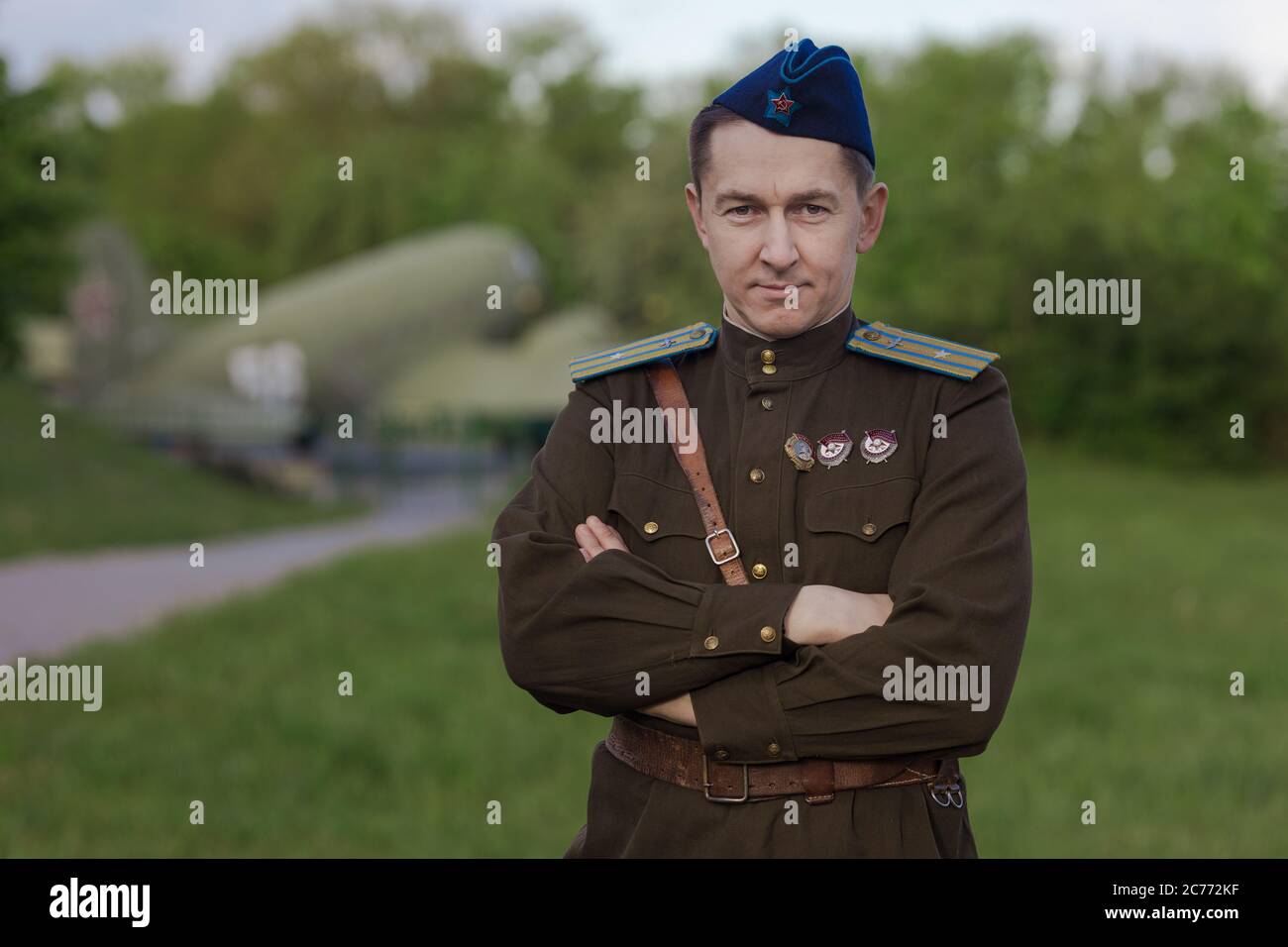 A young adult male pilot in the uniform of pilots of the Soviet Army of ...