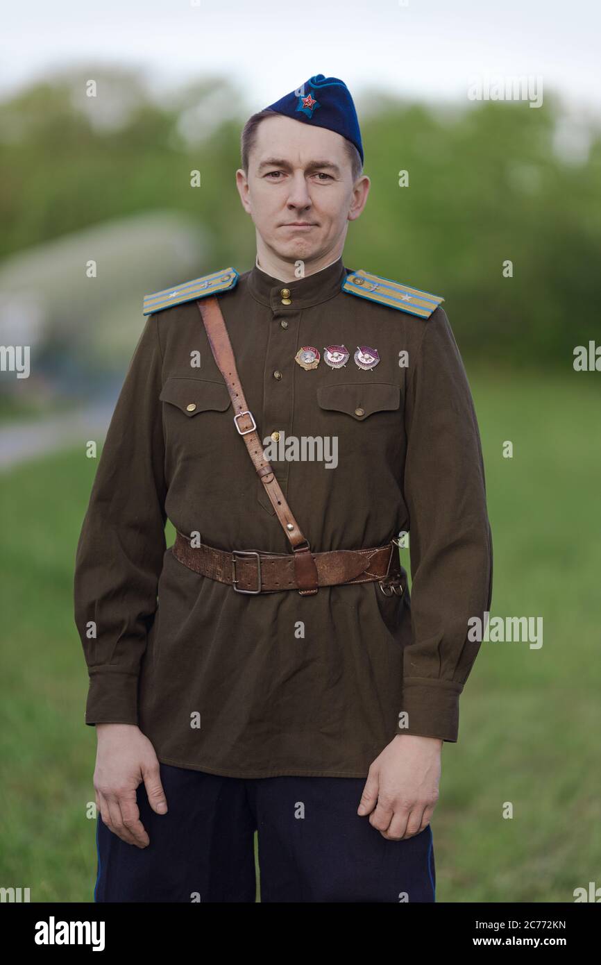 A young adult male pilot in the uniform of pilots of the Soviet Army of ...
