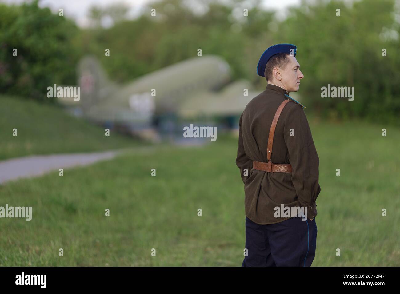 A young adult male pilot in the uniform of pilots of the Soviet Army of ...