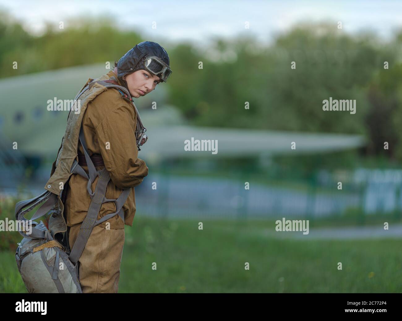 A young female pilot in uniform of Soviet Army pilots during the World ...