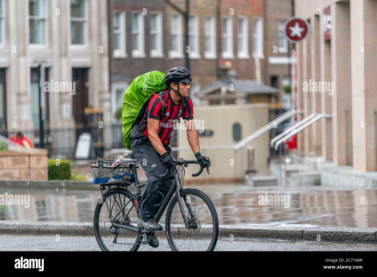 LONDON, ENGLAND - JUNE 10, 2020: Strong handsome young man cyclist ...