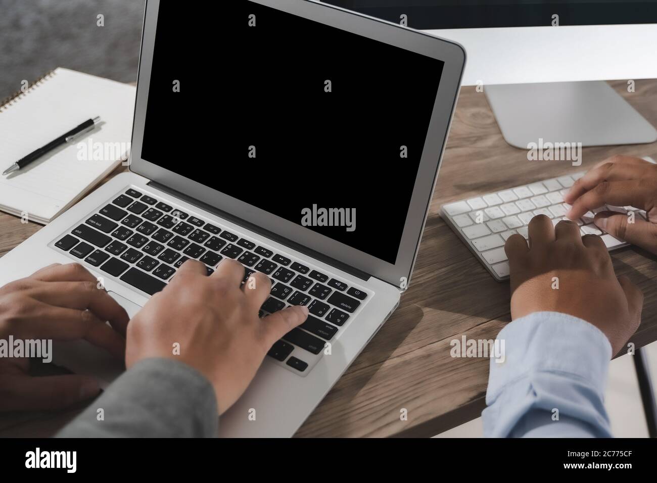 young man working Businessman using a desktop computer of the blank ...
