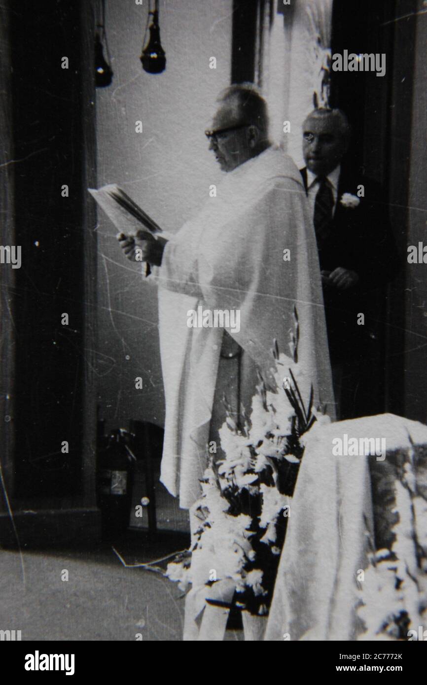 Fine 70s vintage black and white lifestyle photography of priest giving ...