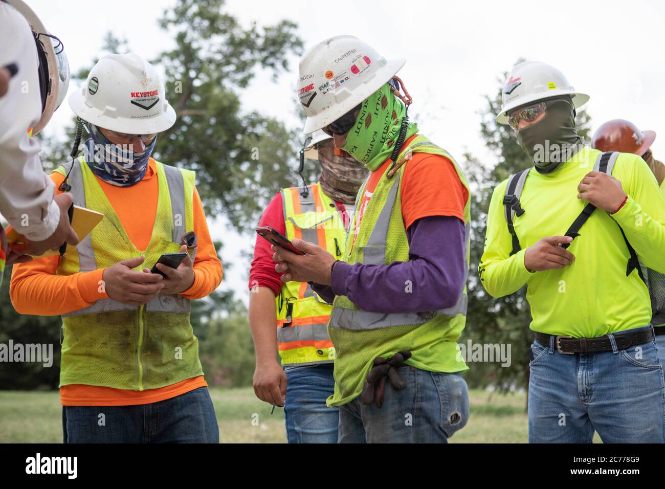 Austin, Texas, USA. 14th July, 2020. Concrete construction workers ...