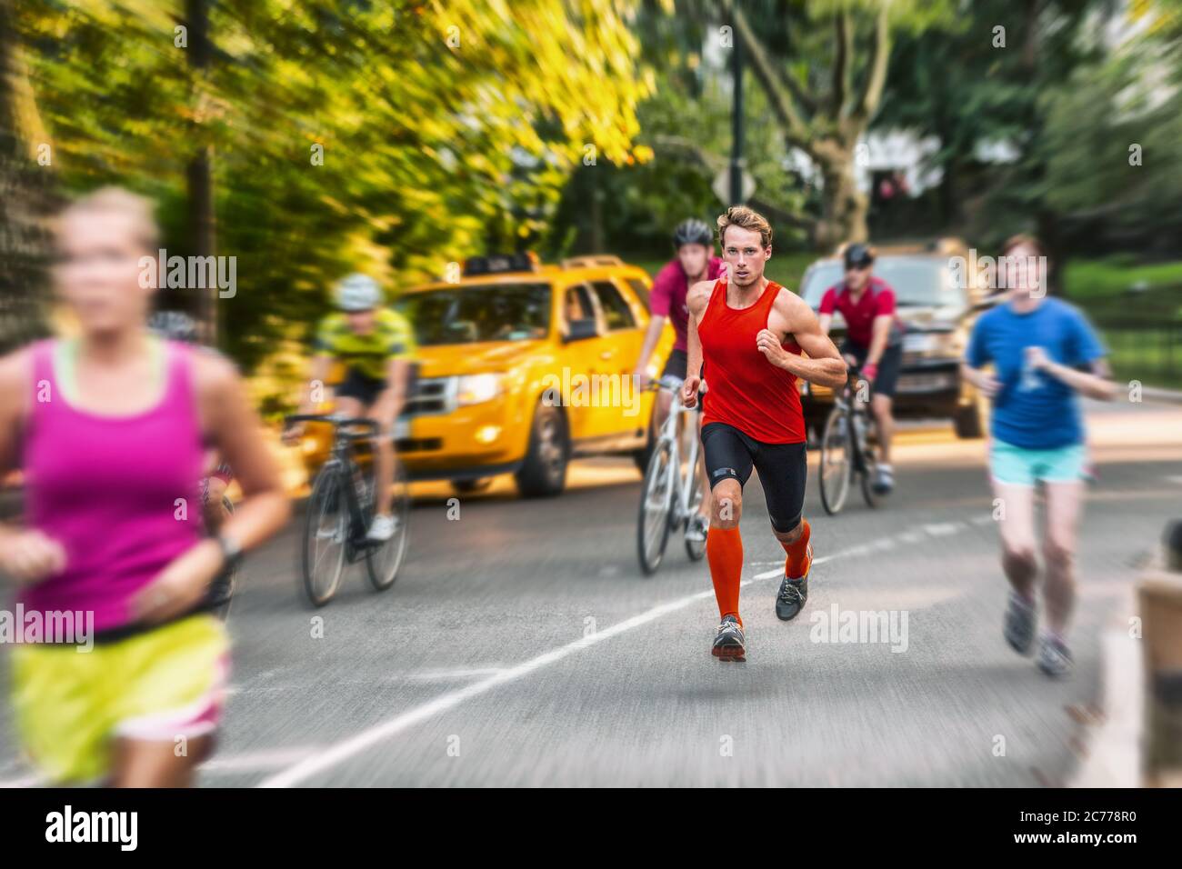 Runner athlete man running in run marathon race in Central Park New ...