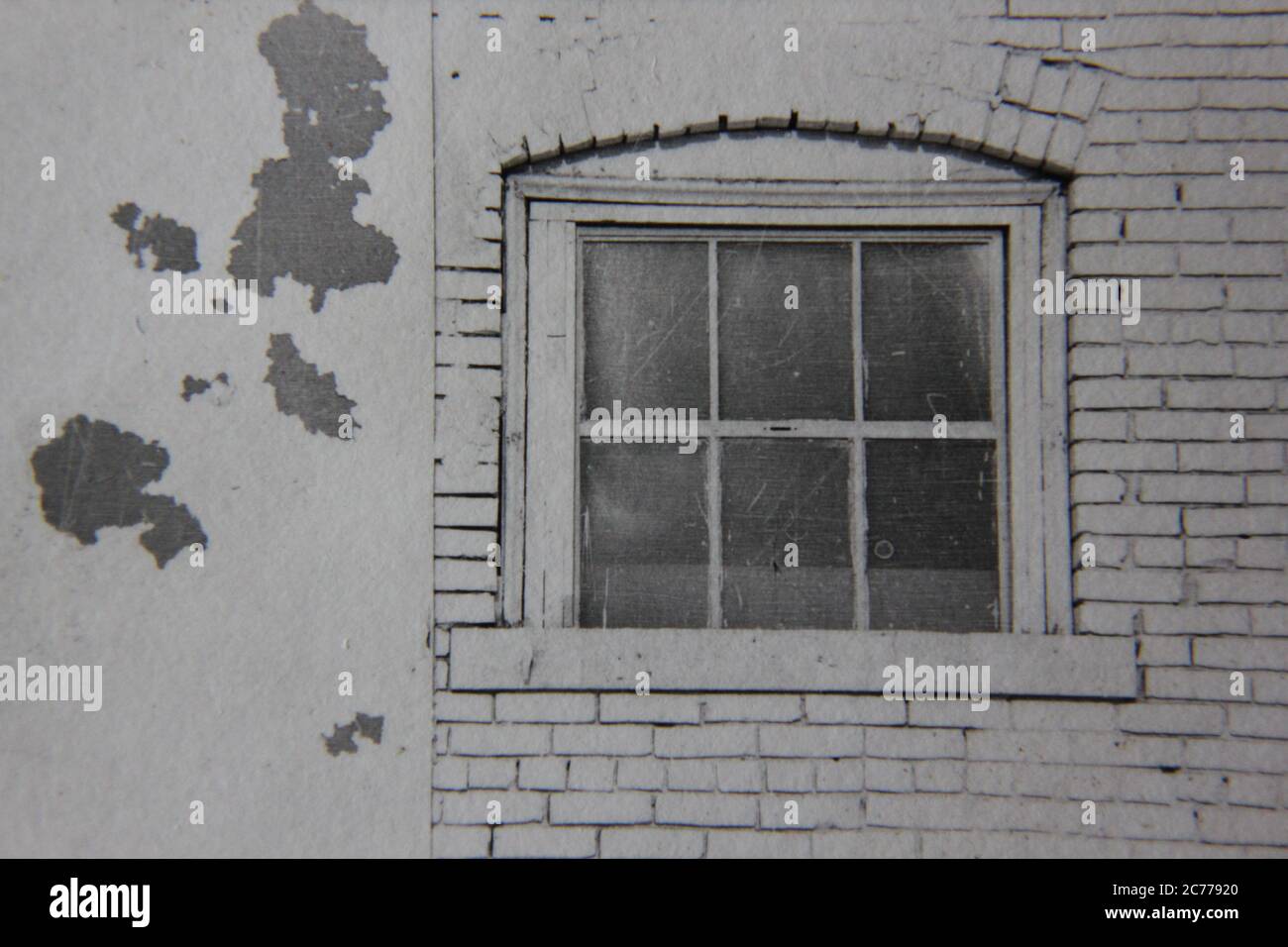 Fine 70s vintage black and white lifestyle street of a worn window ...